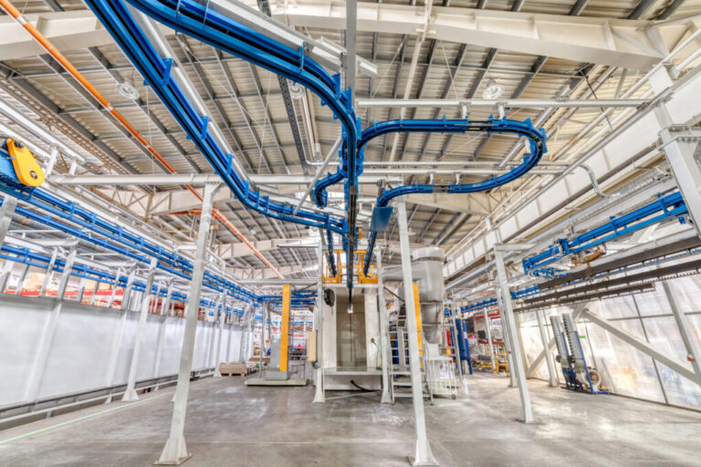 Times an Industrial Paint Booth with Integrated Conveyors Transforms ...